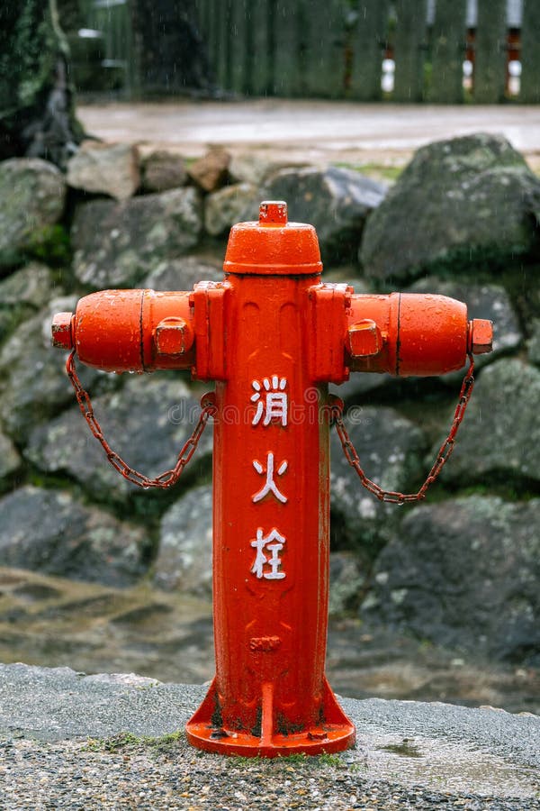 Red Fire Hydrant in the Rain Stock Image - Image of sign, words: 383105535