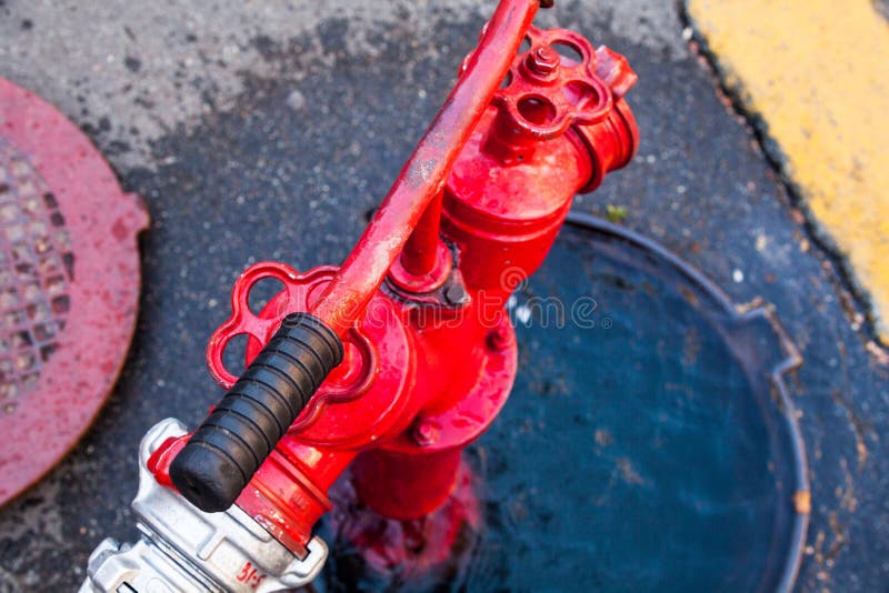 Red fire hydrant stock photo. Image of plug, firefighter - 179660228