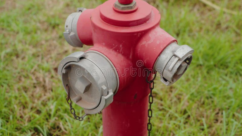 Red Fire Hydrant in Green Grass: Essential Fire Safety Equipment Stock ...