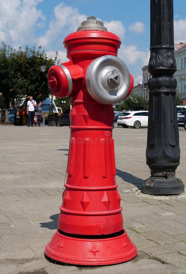 Red Fire Hydrant Stands on City Street Stock Photo - Image of hydraulic ...