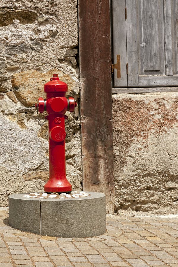 Red Fire Hydrant on a Stone Street Stock Photo - Image of hydrant ...