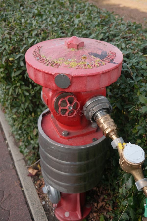 A Red Fire Hydrant with a White Cap Stock Image - Image of utility ...