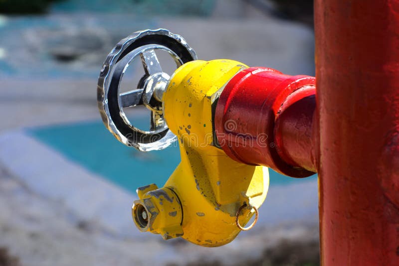 Red Fire Hydrant with Yellow Connectors. Fire Hydrant or Fire Pump ...