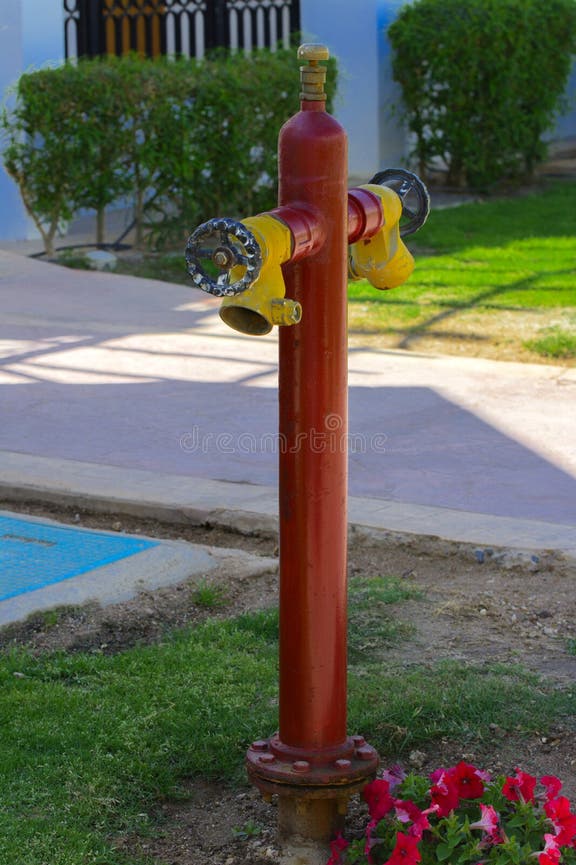 Red Fire Hydrant with Yellow Connectors. Fire Hydrant or Fire Pump ...