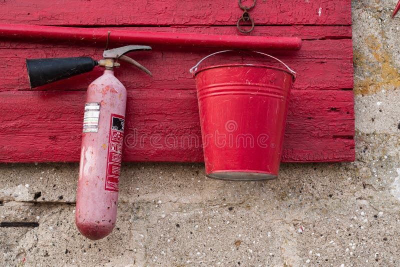 Red Fire Shield on a Stone Wall Stock Image - Image of bucket ...