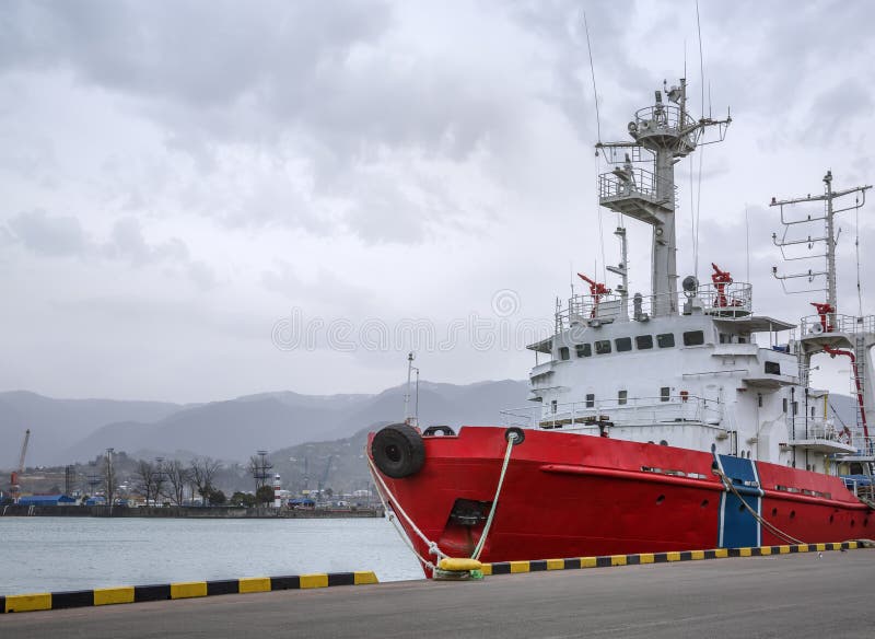 A Red Fire Ship is Moored To the Pier. Close-up Stock Photo - Image of ...