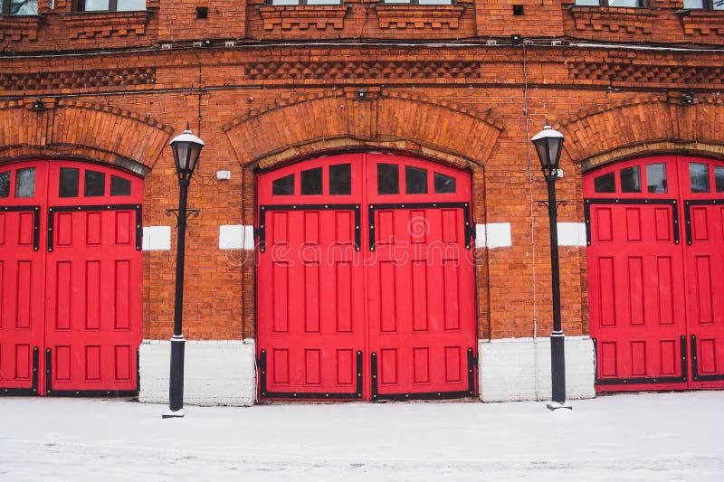 Red Fire Station Doors on Red Brick Wall Building Stock Photo - Image ...