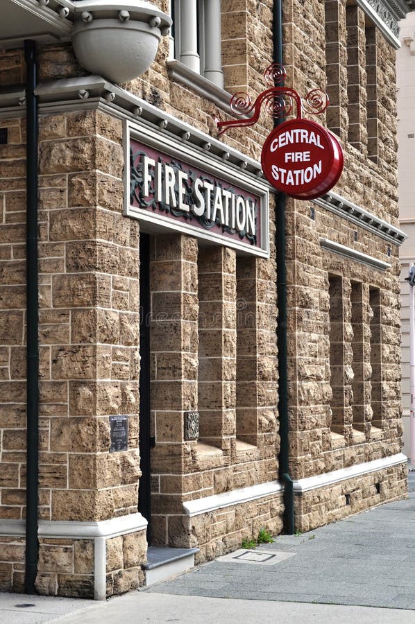 Red Fire Station Sign and Fire Station Stock Image - Image of station ...