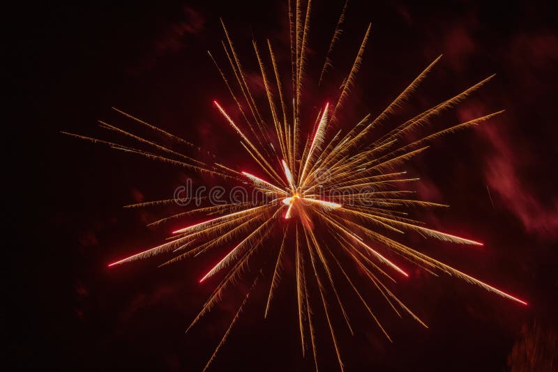 Red Firework Exploding in Sparks and Smoke at Night Stock Image - Image ...