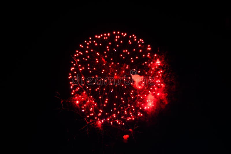 A red firework stock photo. Image of horizontal, nighttime - 303311640
