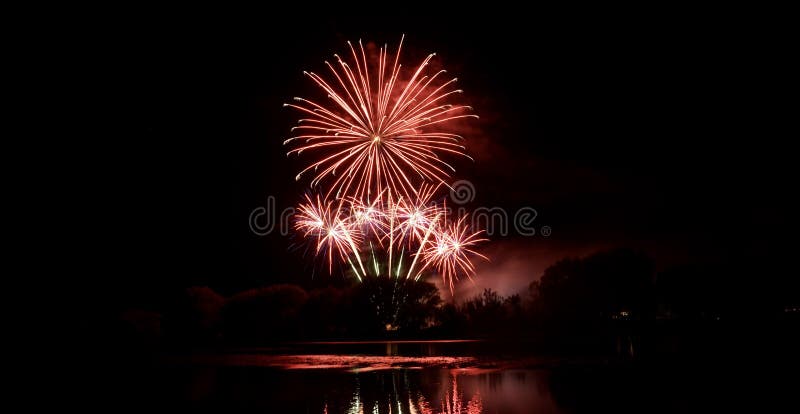 Red firework stock image. Image of reflection, firework - 165415347