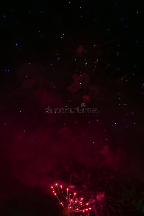Red firework in smoke stock photo. Image of haze, bright - 326296010