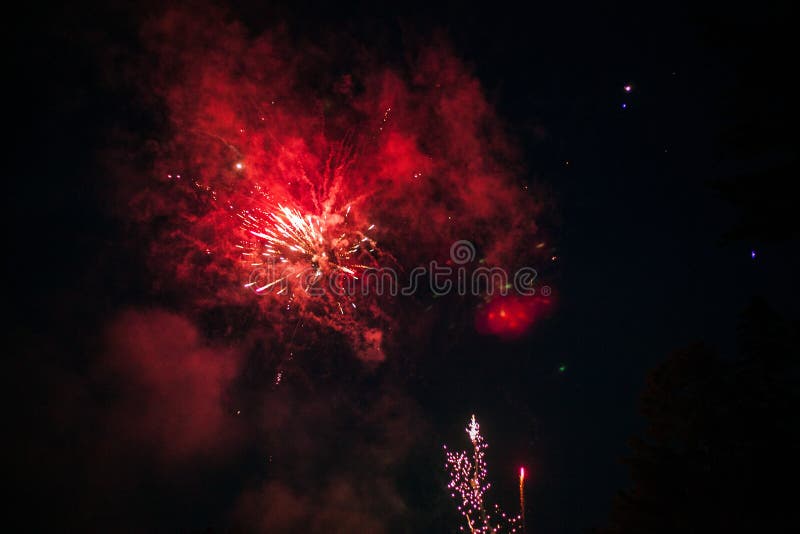 Red Fireworks in the Starry Night Sky Stock Photo - Image of tree ...
