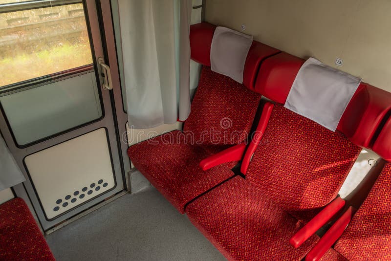 Red First Class Compartment in Train with Sunny Shine in Evening Stock ...