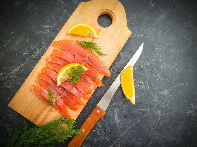 Red Fish Pieces, Lemon Eating Ingredient Cooking on Concrete Background ...