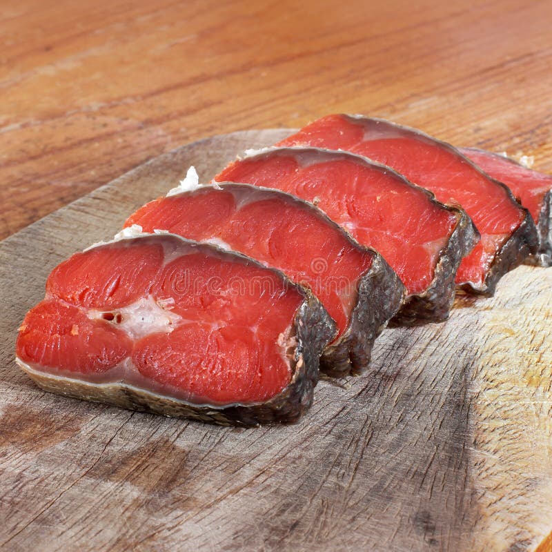 Red Fish. Sliced Red Fish on a Cutting Board Stock Photo - Image of ...