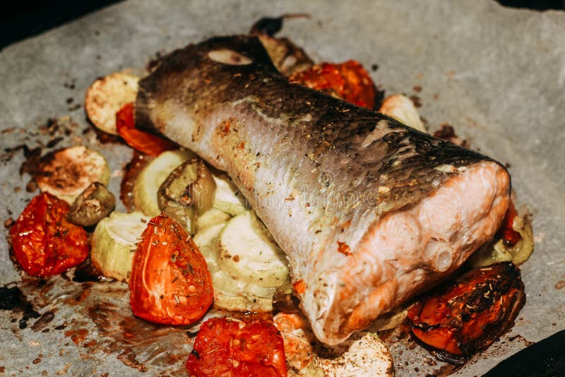 Red Fish Trout Salmon Baked in the Oven with Vegetables. Stock Photo ...