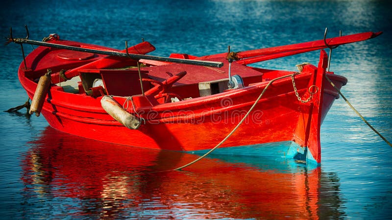 Red Fishing Boat Reflected In The Water Stock Photo - Image of ...
