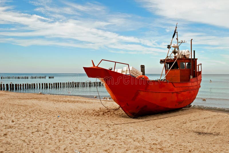 Red Fishing Boat on the Seashore Stock Photo - Image of europe, fishing ...