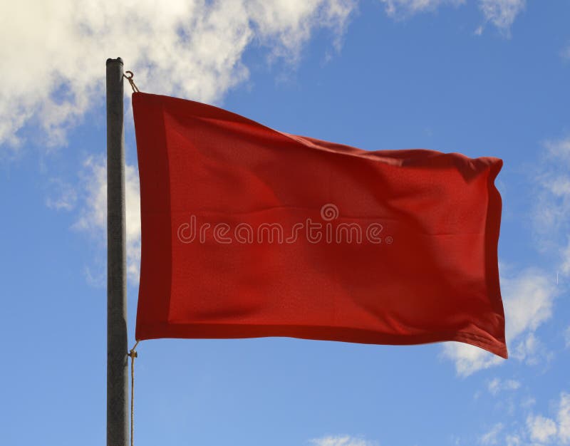 A red flag at the beach stock image. Image of safe, waves - 352437739