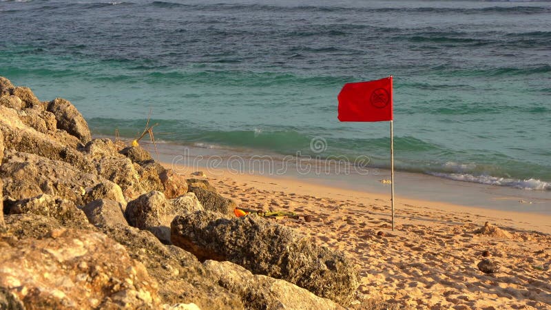 A Red Flag on the Beach Means that Swimming in the Water is Dangerous ...