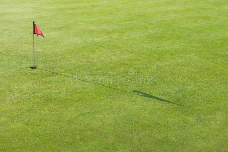 A Red Flag in the Hole on the Golf Course Stock Photo - Image of nature ...