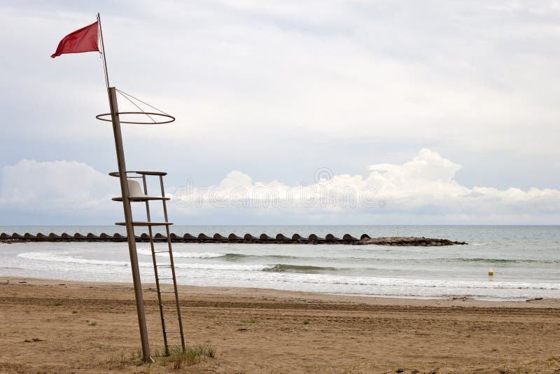 A Red Flag in a Lifeguard Tower Warn Swimmers of Danger of Bathing in ...