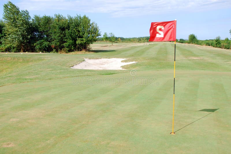 Red Flag Number Two on Golf Course Stock Image - Image of blue, flag ...