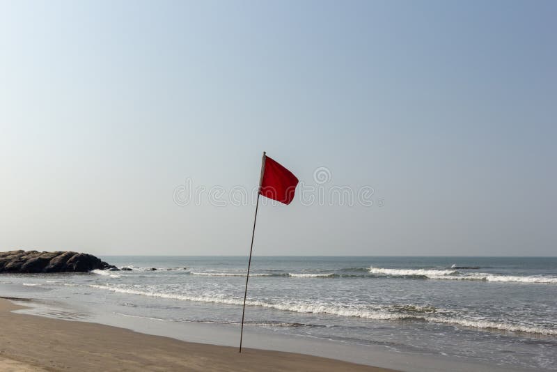 Red Flag on the Ocean. Warning Red Flag Stock Image - Image of sign ...