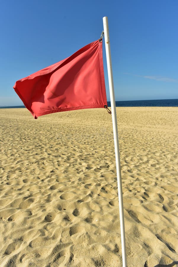 Red Flag on Flag Pole Blowing in Wind Cloudy Sky Stock Image - Image of ...