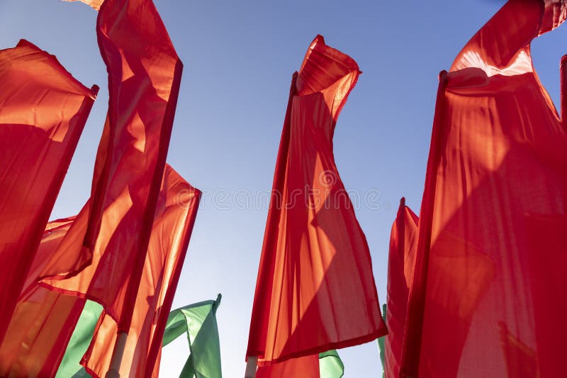 Red Flags Set Up during the Celebration in Windy Weather Stock Photo ...