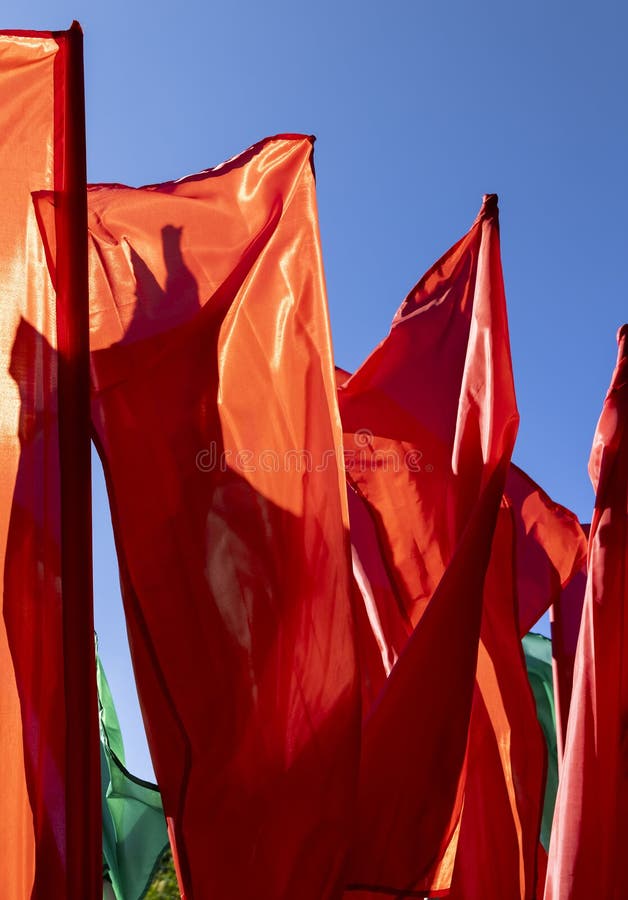 Red Flags Set Up during the Celebration in Windy Weather Stock Photo ...