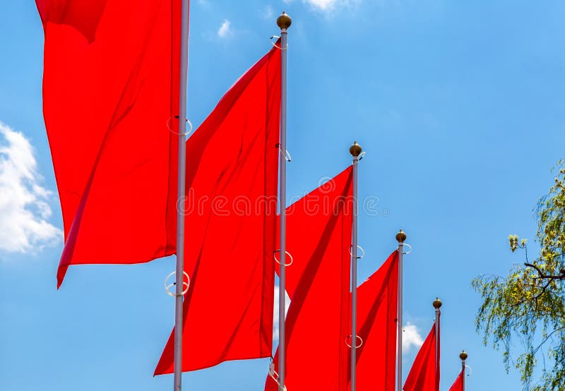 Red Flags Waving on the Blue Sky Stock Image - Image of high ...