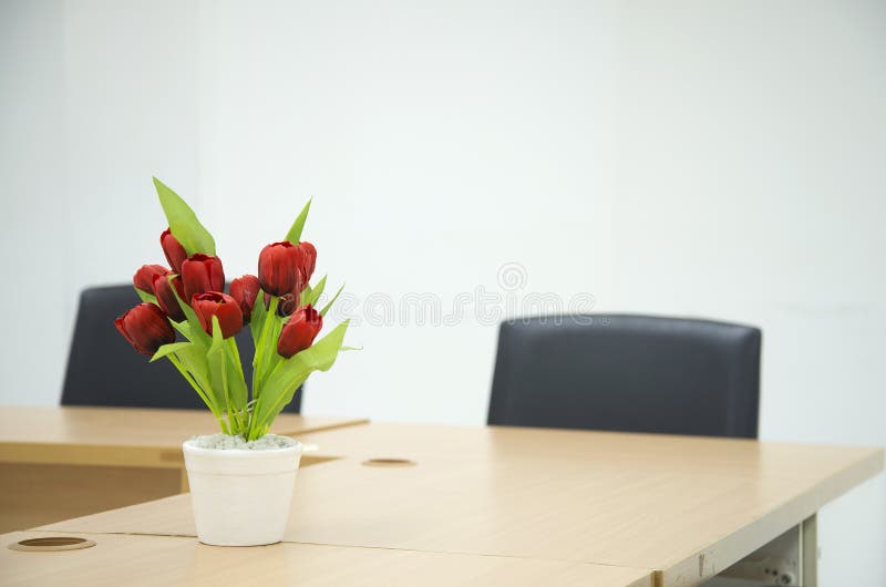 Red Flower on Meeting Room Table Stock Photo - Image of black, armchair ...