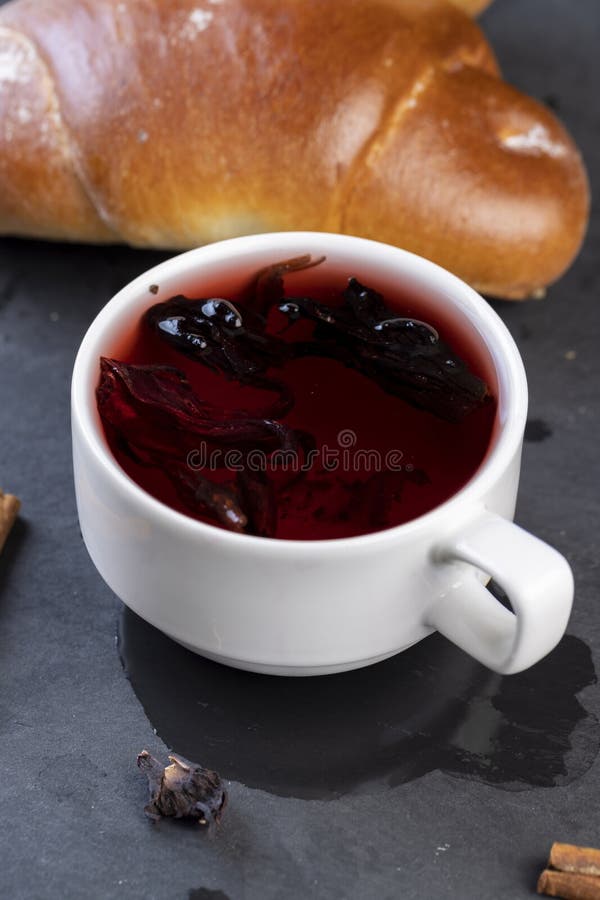 Delicious Red Tea from Rose Buds on the Table Stock Photo - Image of ...