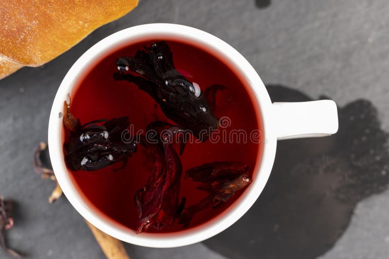 Delicious Red Tea from Rose Buds on the Table Stock Image - Image of ...