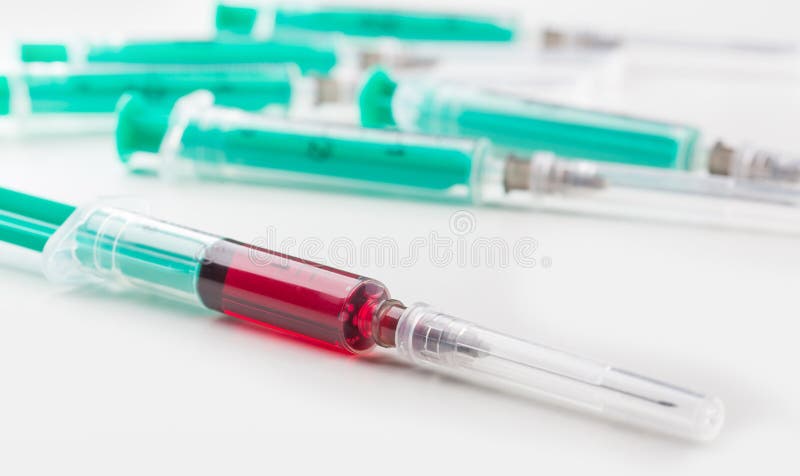 A red fluid syrenge stock image. Image of syrenges, needle - 75372021