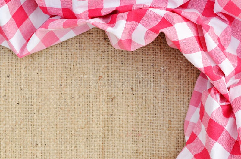 Folded Red Checkered Cloth on White Table Top View.Picnic Towel on ...