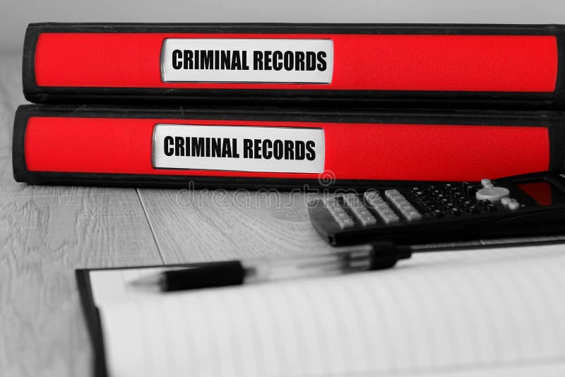 Red Folders with Criminal Records Written on the Label on a Desk Stock ...