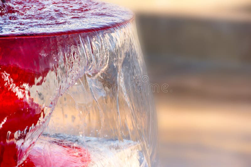 Red Fountain on a Light Background. Water Stock Image - Image of city ...
