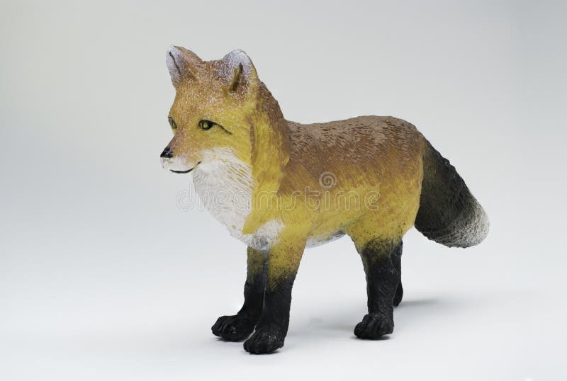 Red Fox Figurine with White Chest Stock Image - Image of black ...