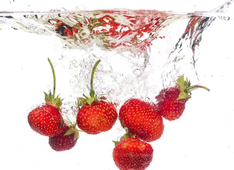 Red Fresh Strawberries Thrown into the Water, Under Water. Spat and ...