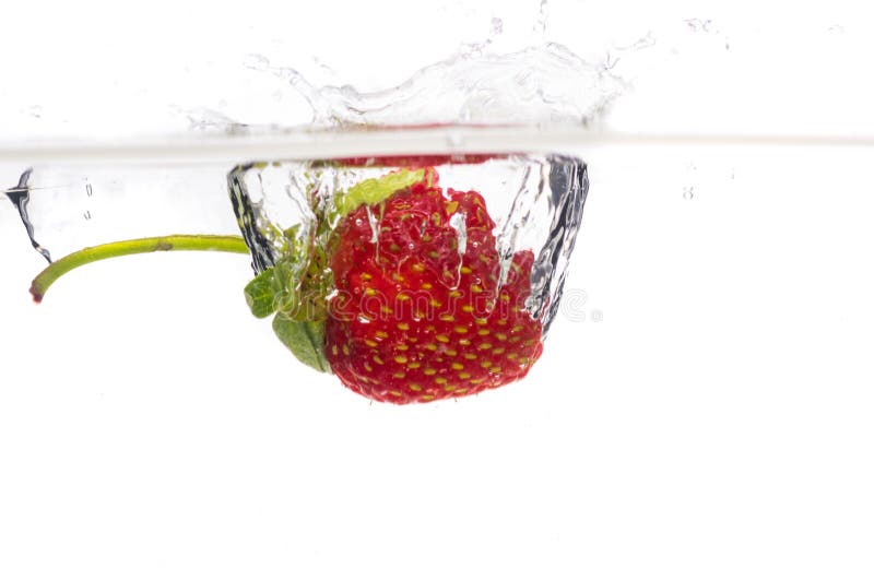 Red Fresh Strawberries Thrown into the Water, Under Water. Spat and ...