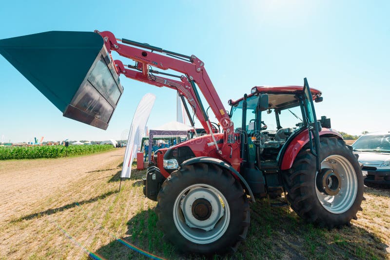 Red front-end loader stock photo. Image of fair, farming - 140980244