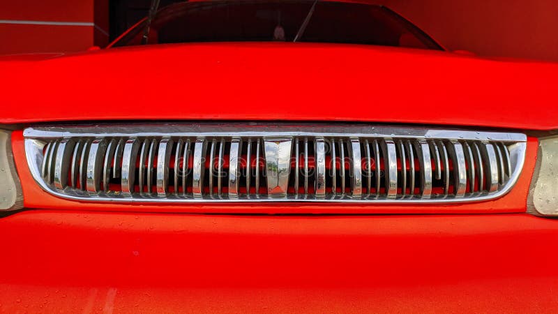 Red Front Hood and Metalic Grill of an Old Car Stock Photo - Image of ...