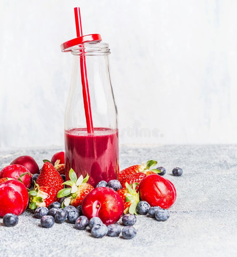 Red Fruits Smoothie in Bottle with Drinking Straw and Fresh Berries ...