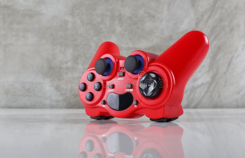 Red Gamepad on the Background of a Concrete Wall with Reflection Stock ...