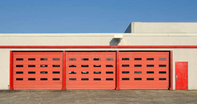 Red garage doors stock image. Image of exterior, doors - 16095543