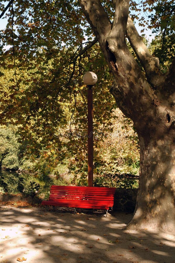 Red garden bench stock image. Image of landscape, calm - 88494335