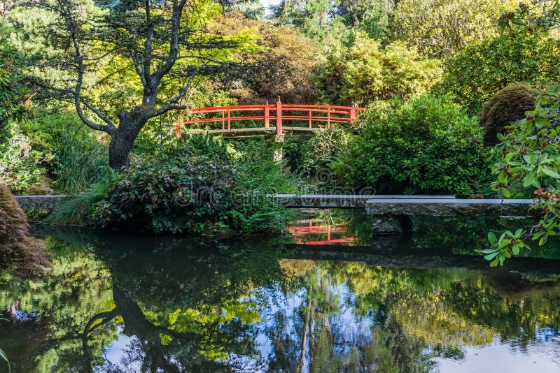 Red Garden Bridge and Pond stock image. Image of seattle - 254567967